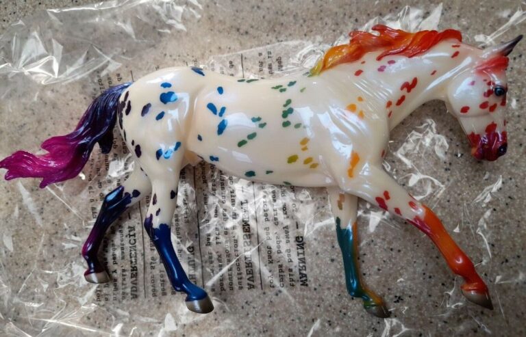 Seven Arts Surprise – Glossy Rainbow | Breyer Value Guide